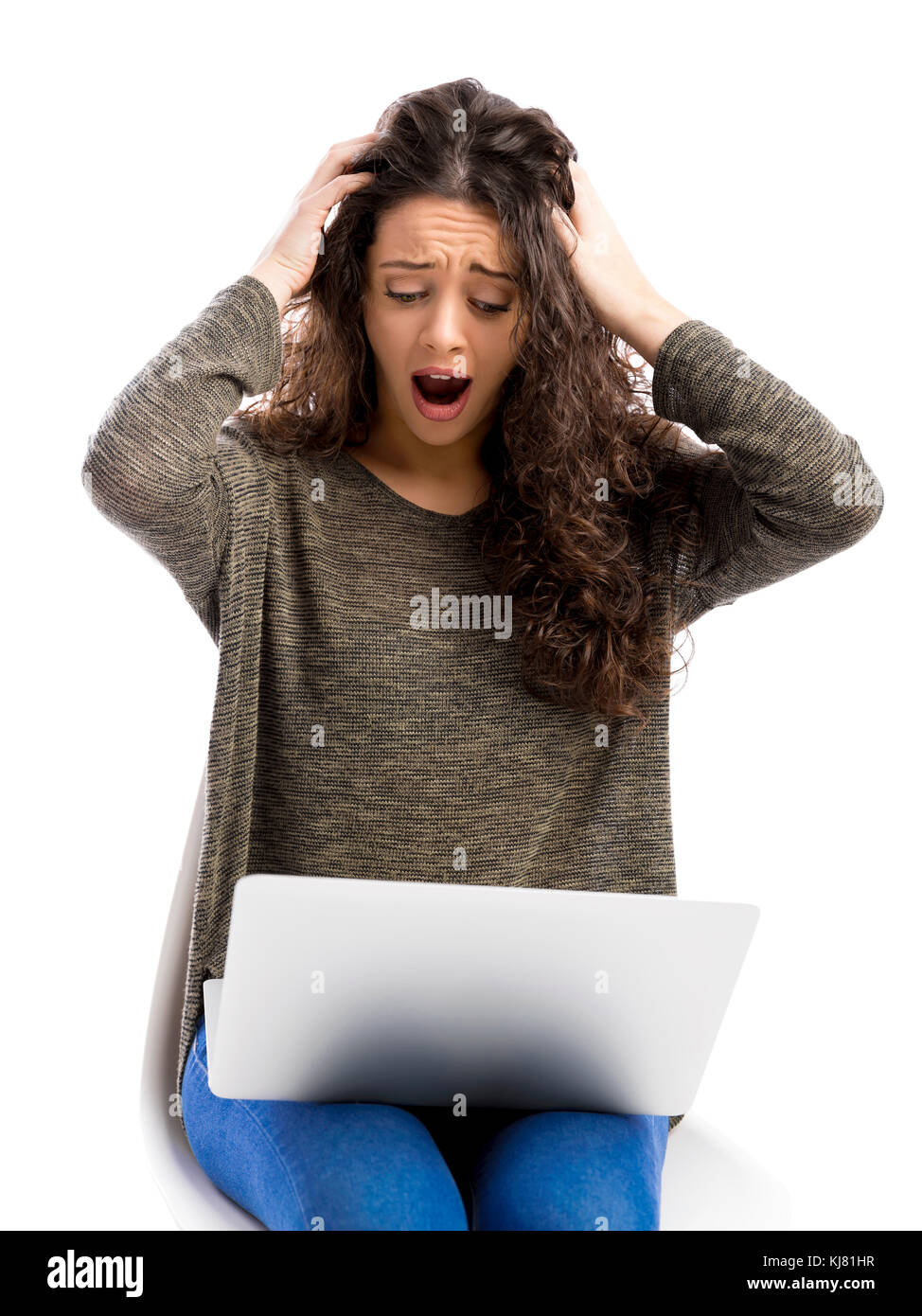 Beuaitful woman in trouble with her laptop, isolated over white ...