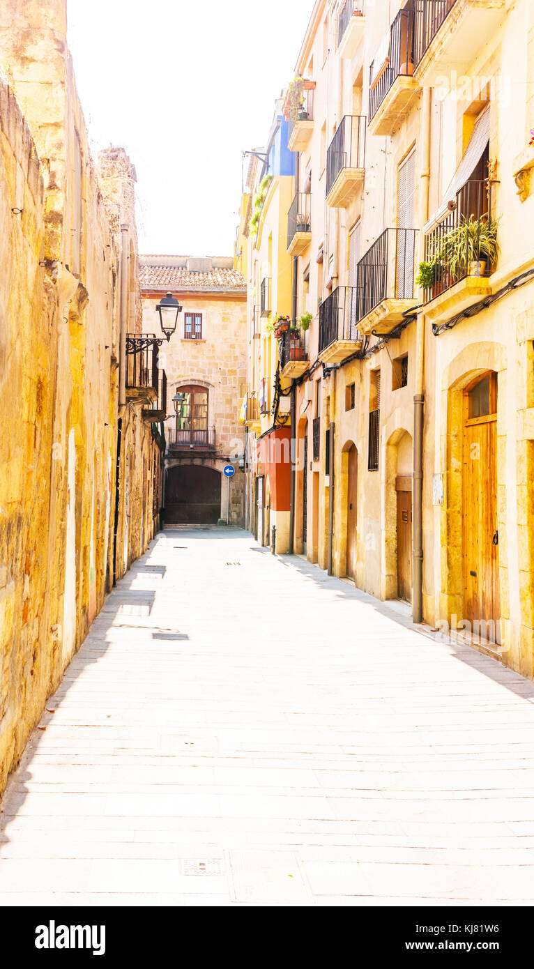 charming narrow street, street with colorful facades of buildings ...