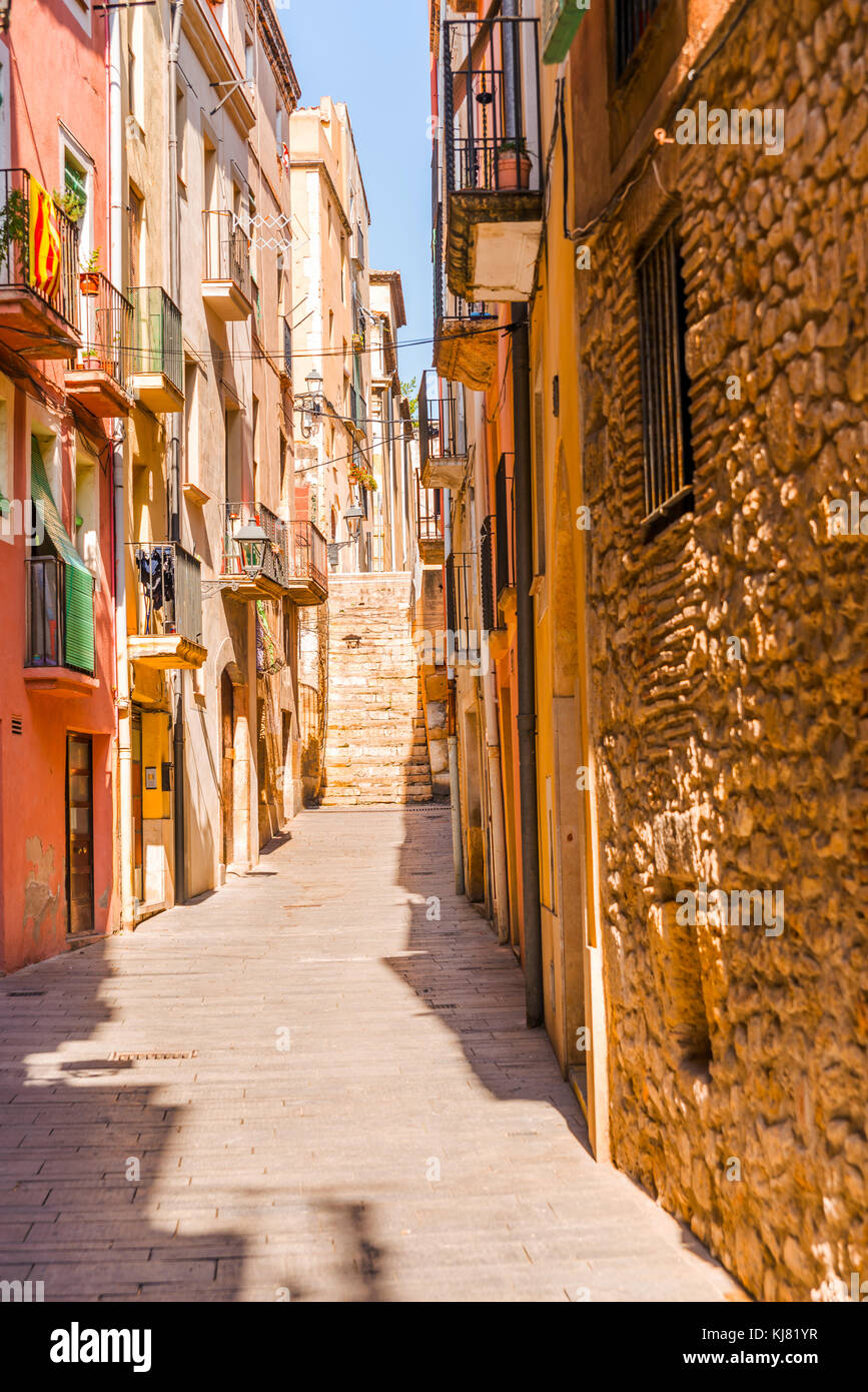 charming narrow street, street with colorful facades of buildings ...