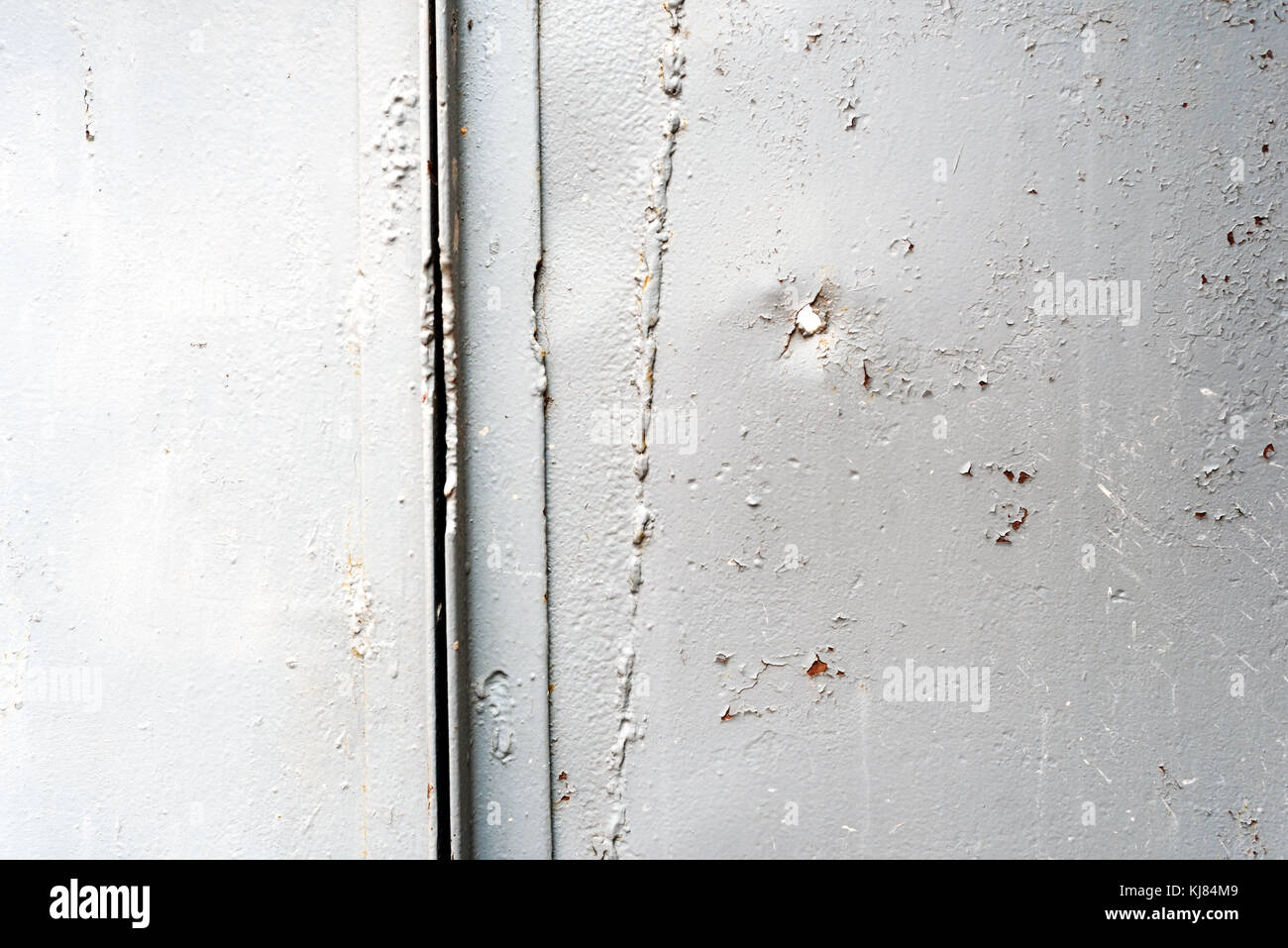 Silver painted sheets of steel metal with welds and fabrications ...