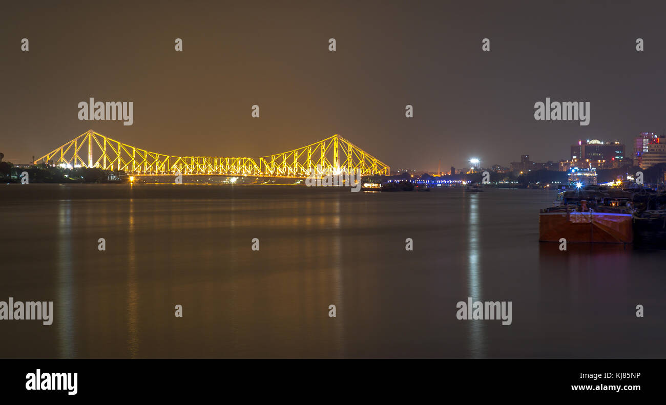 Historic Howrah bridge and Kolkata cityscape as seen from Princep Ghat ...