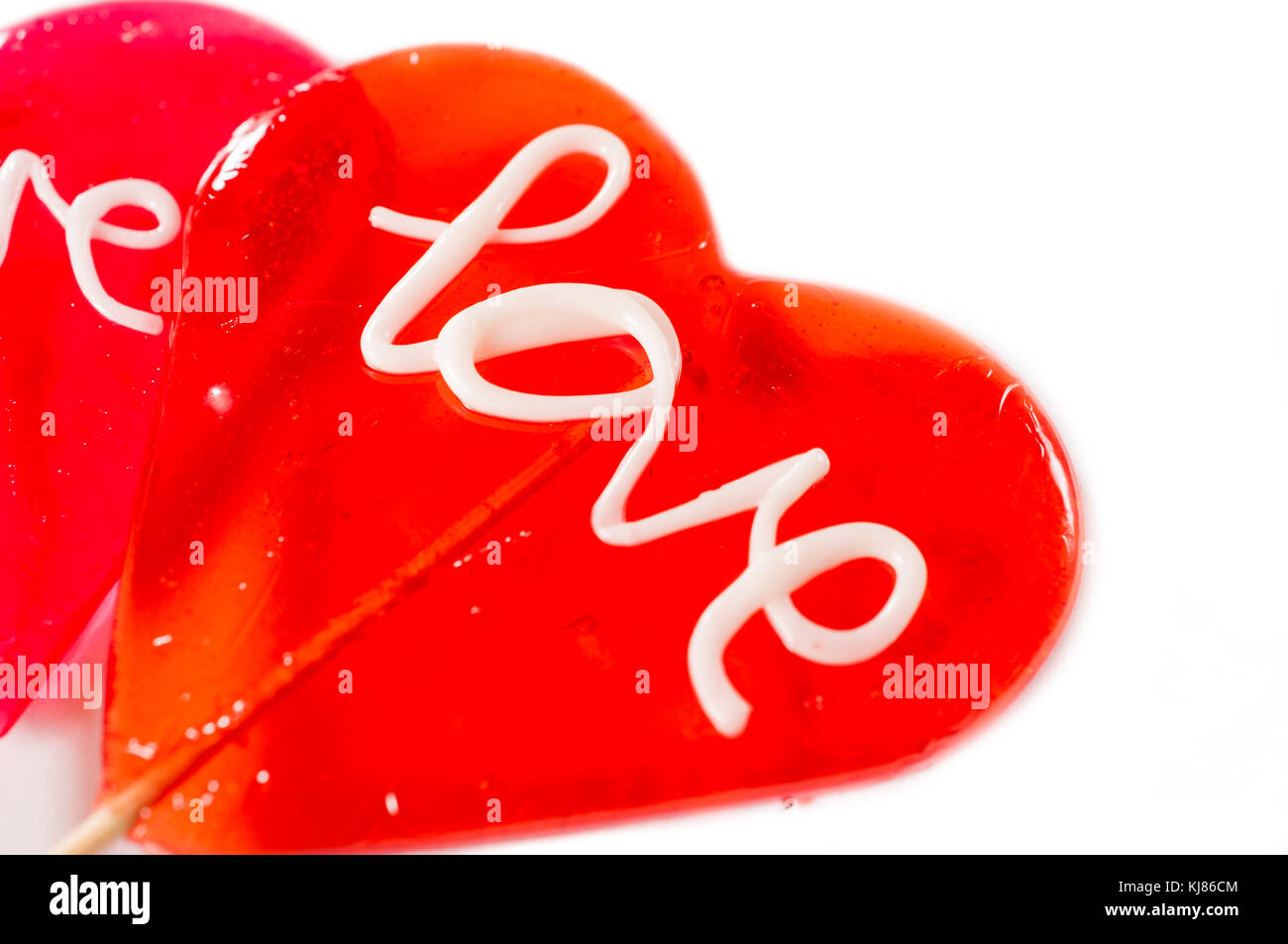 Love lolly pops isolated on white background Stock Photo - Alamy