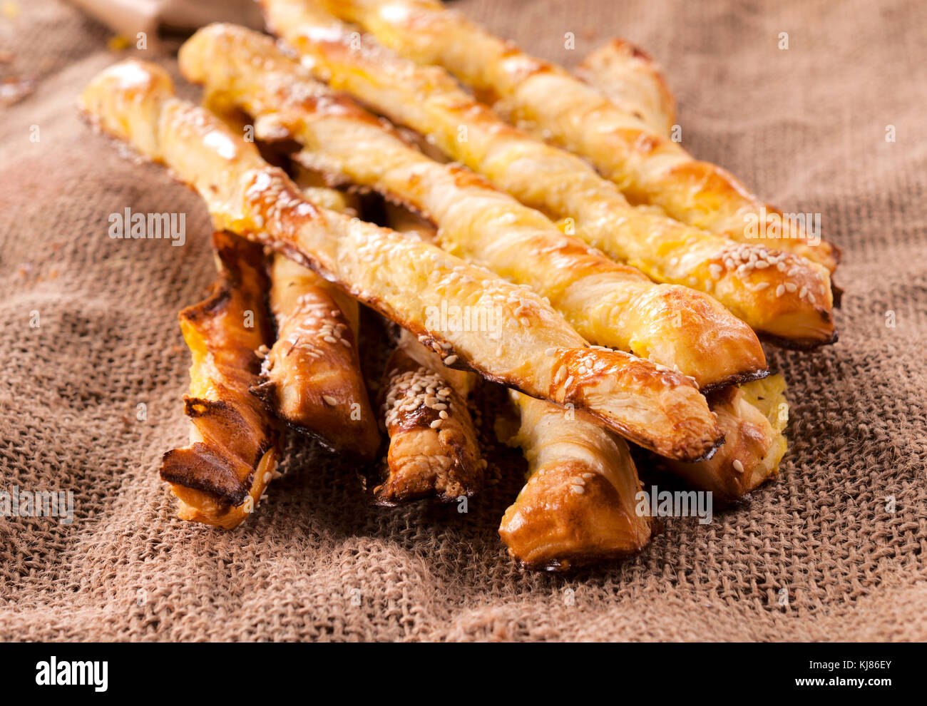 Pastry snack with cheese and sesame Stock Photo - Alamy