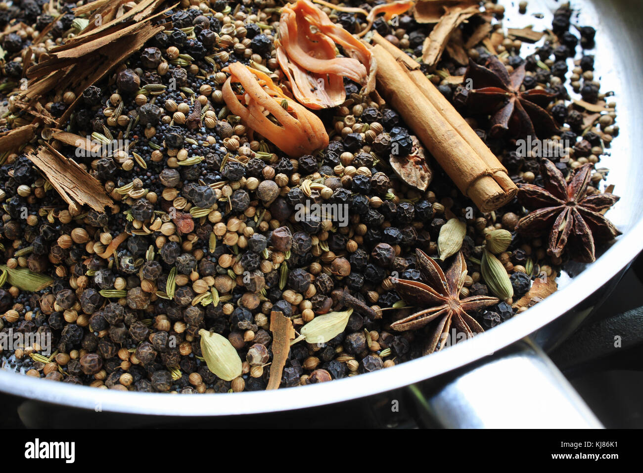 roasting mixed spices Stock Photo - Alamy