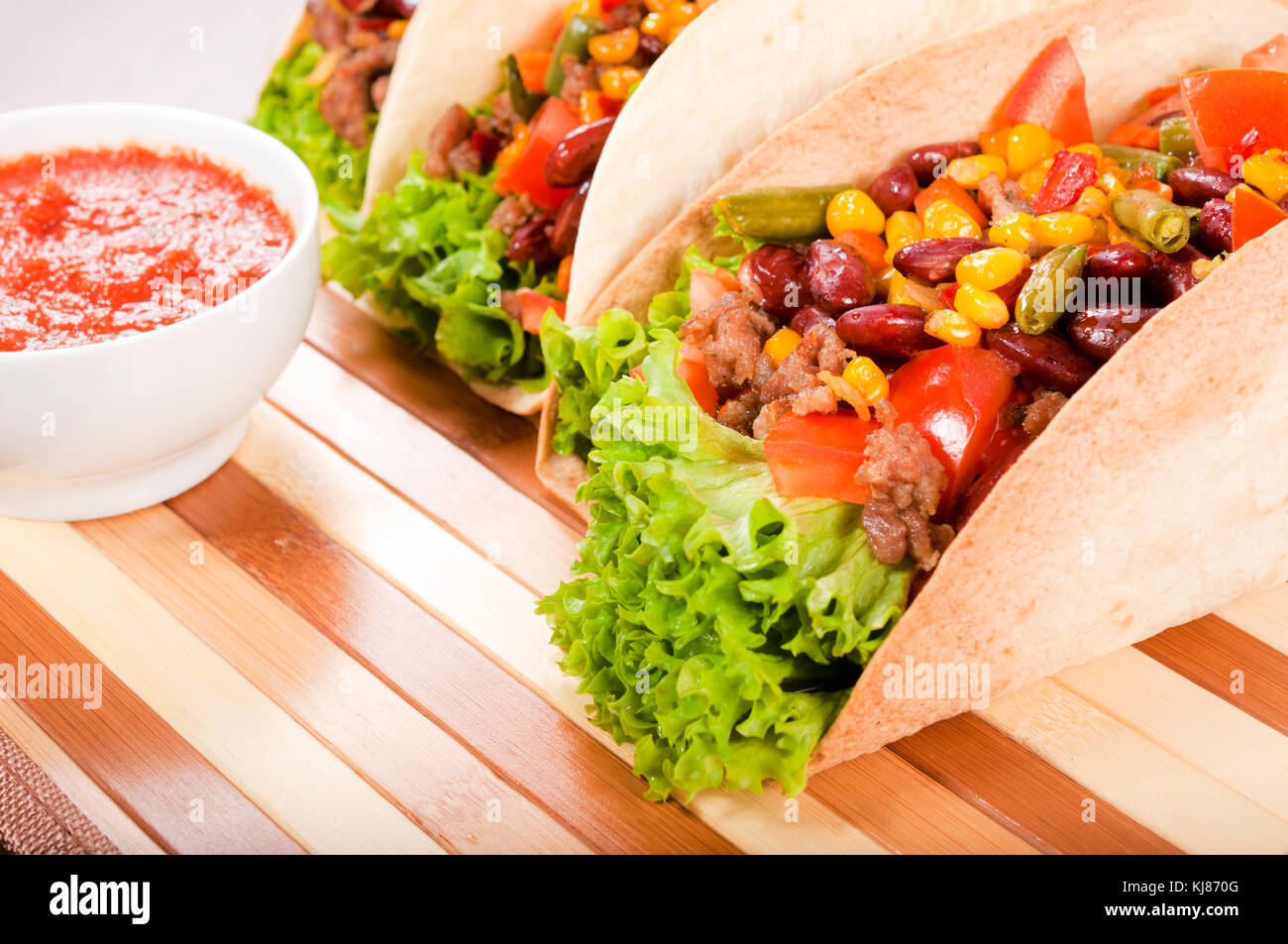 Selective focus on the front taco sandwich Stock Photo - Alamy
