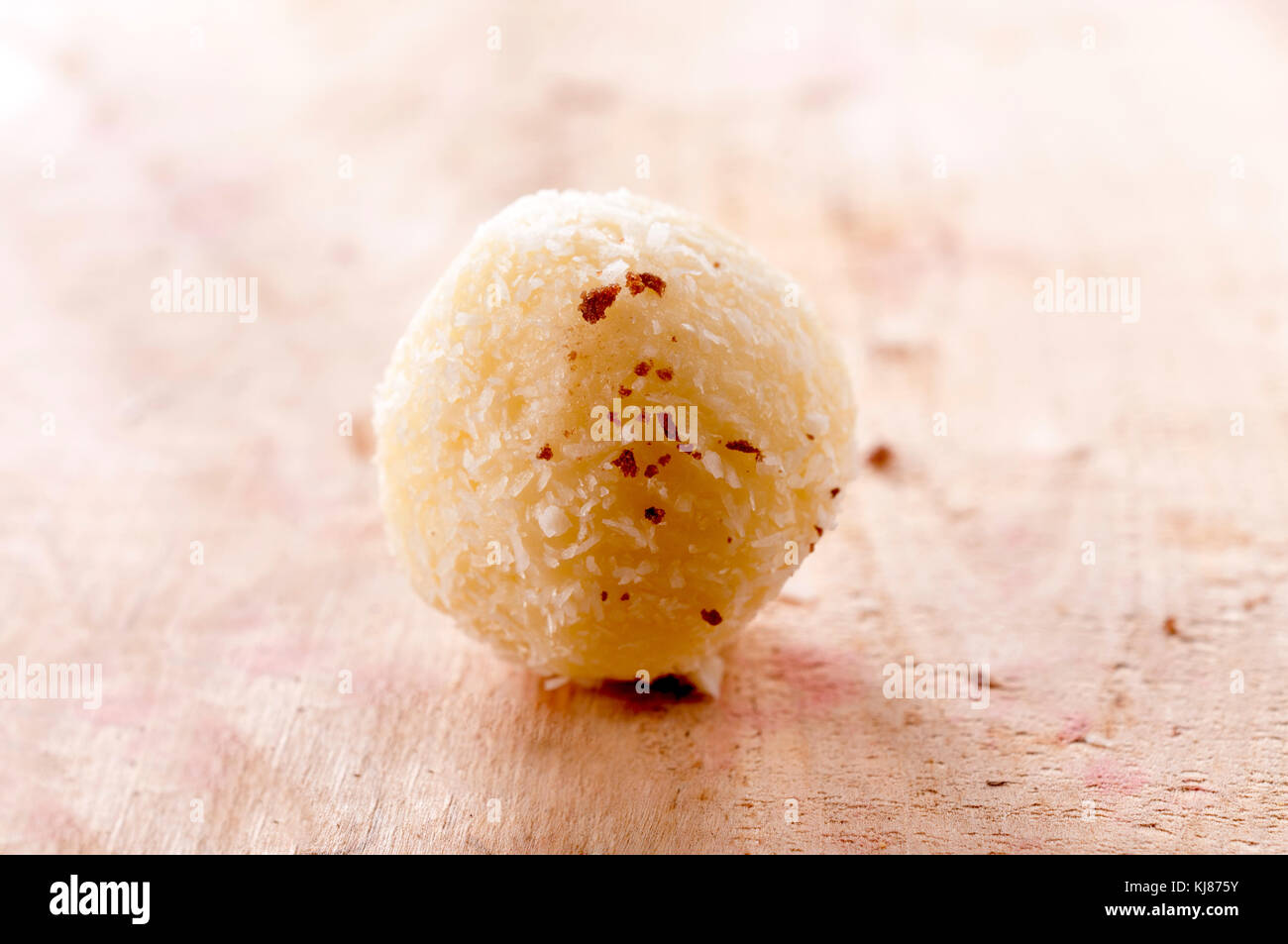 Single coconut homemade praline Stock Photo - Alamy