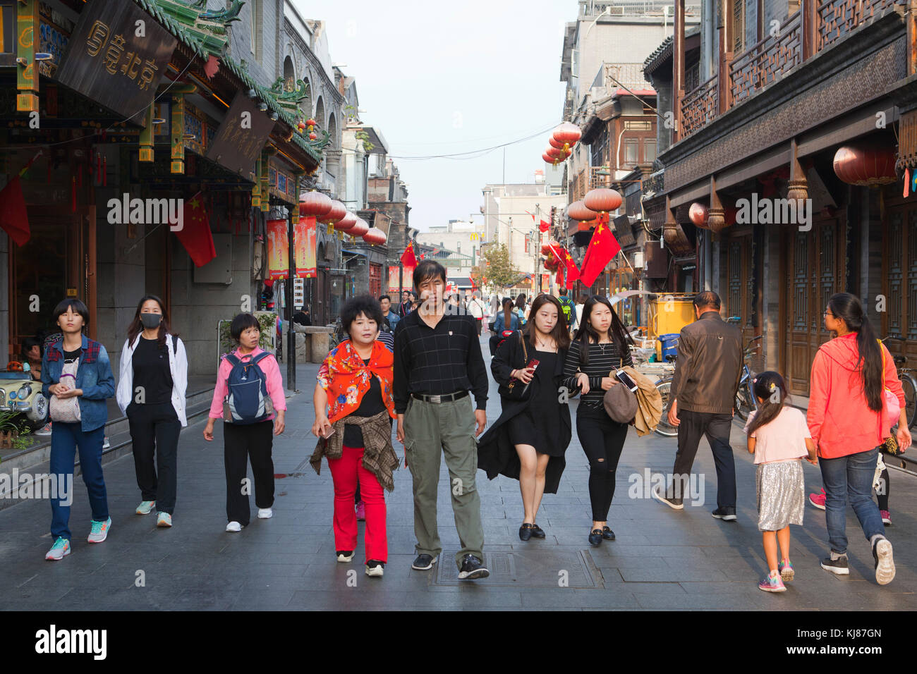 People walk down Dashilan Street in Beijing Stock Photo - Alamy