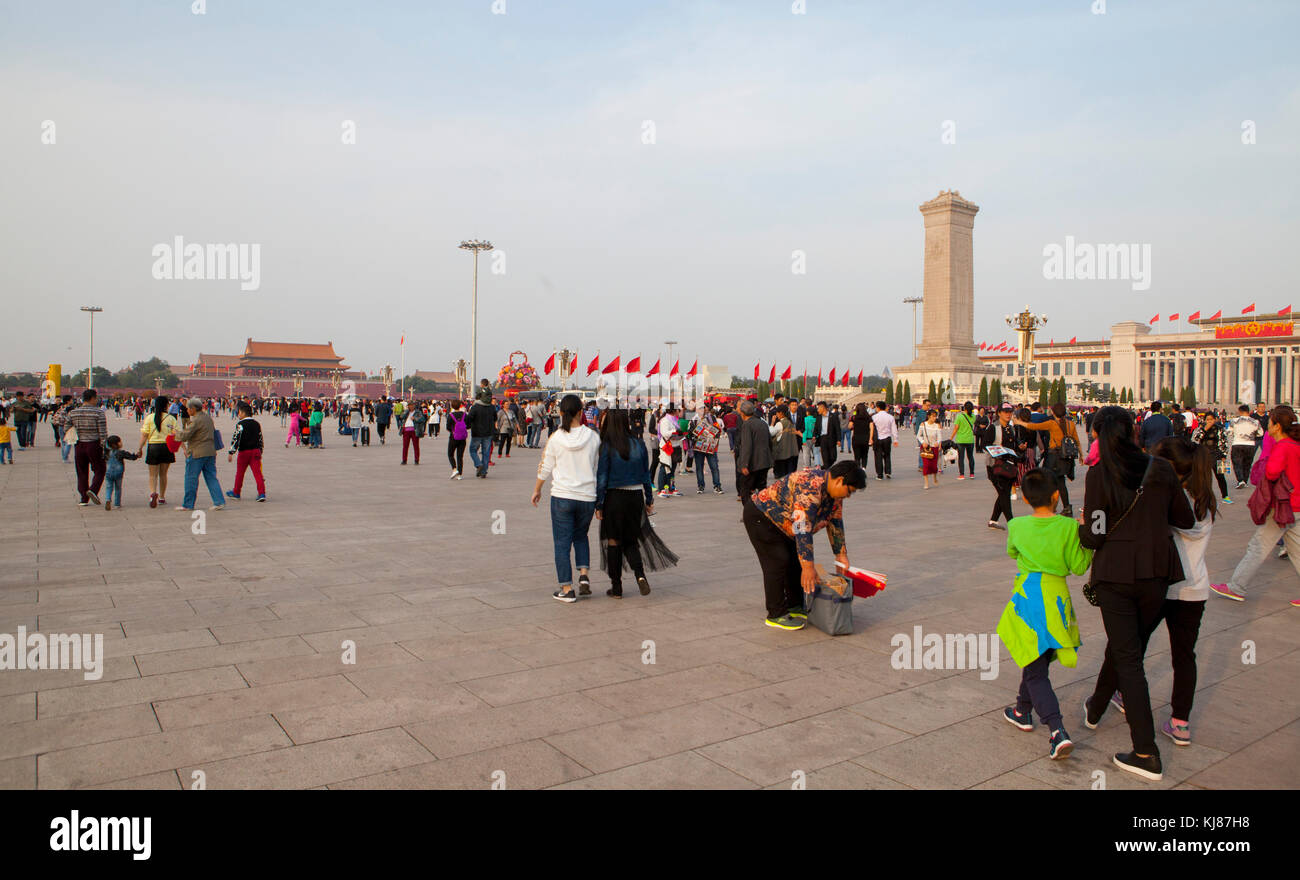 People walk through Tiananmen Square in Beijing Stock Photo - Alamy