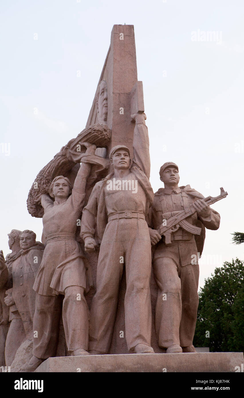 A communist statue in front of Mausoleum of Mao Zedong in Tiananmen ...
