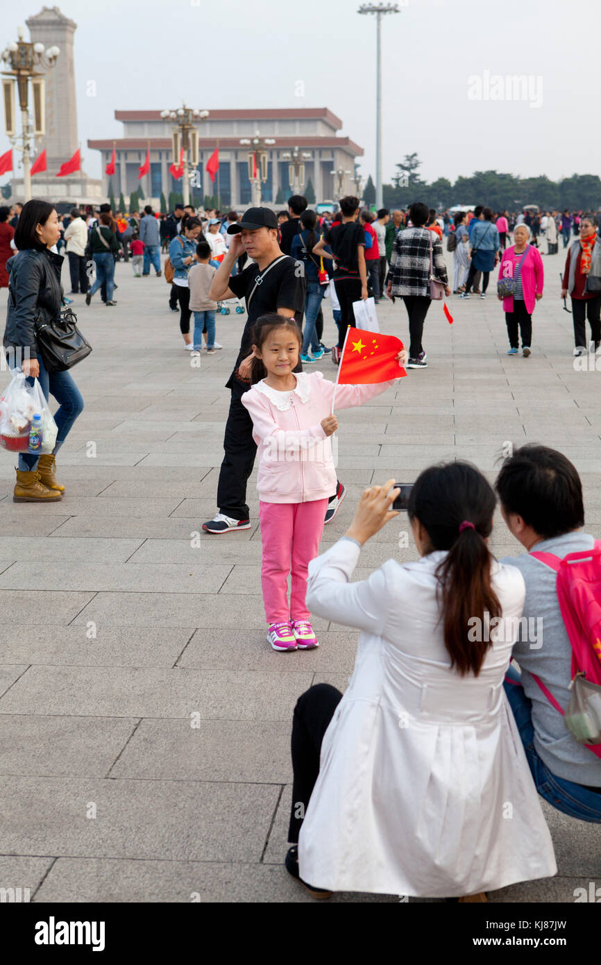 People walk through Tiananmen Square in Beijing Stock Photo - Alamy
