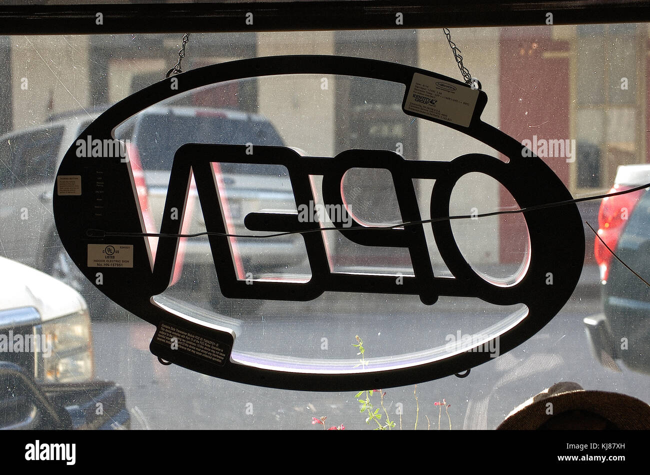Neon sign that says open, view from inside antique store Stock Photo ...