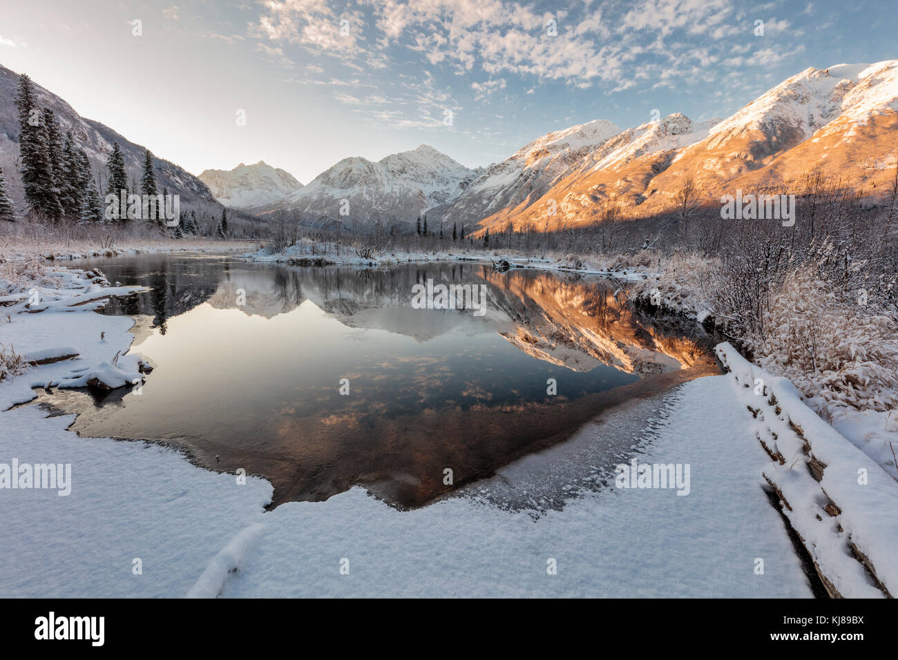 Dawn light illuminates the season's first snow as it blankets Eagle ...