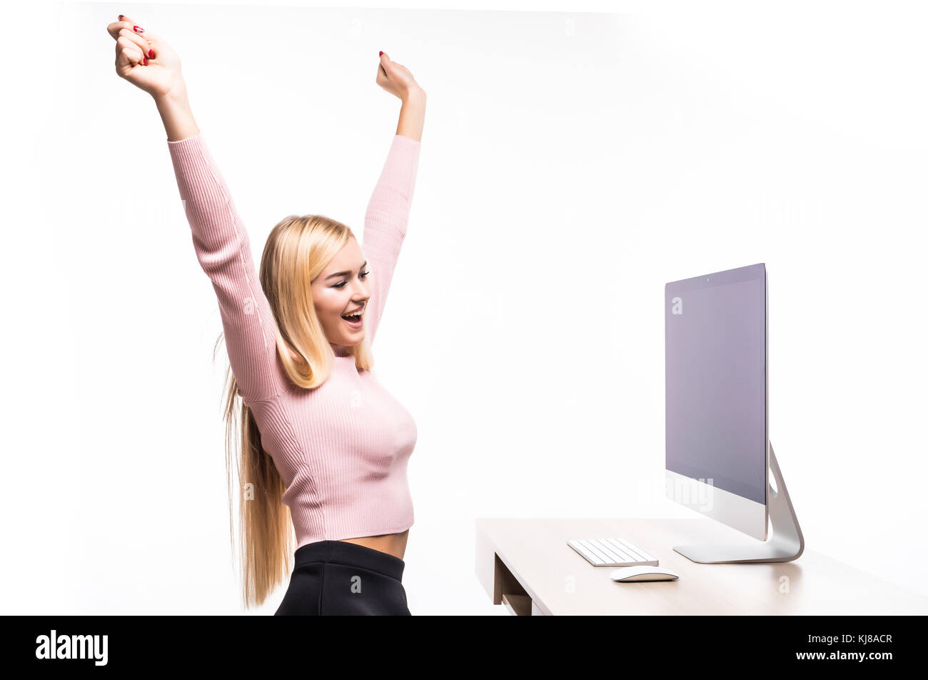 happy businesswoman looking in monitor. isolated on white background ...