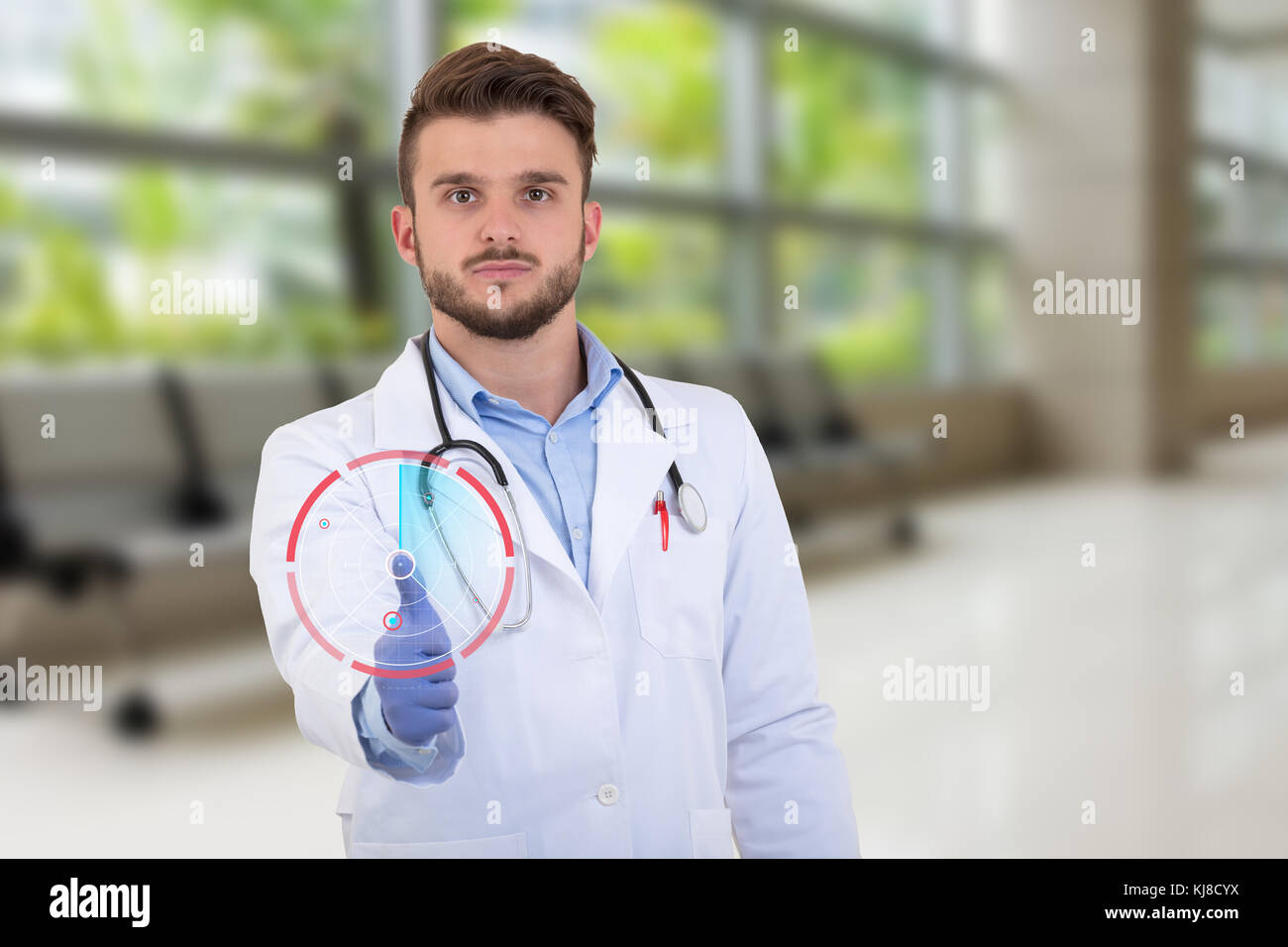 A male doctor showing ok, with illustrated chart on finger Stock Photo ...