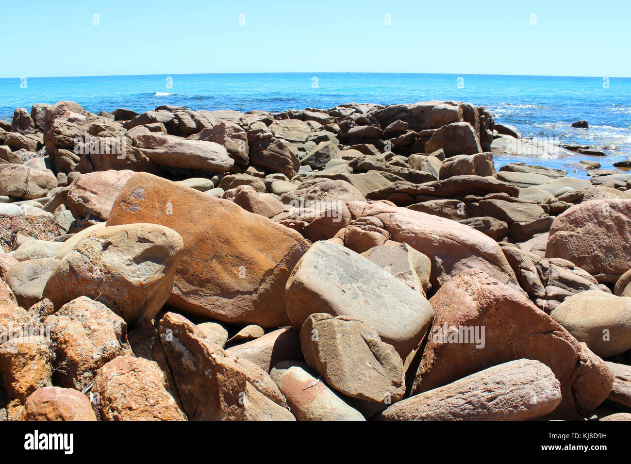 Ancient rock formations on shore at Bunker's Bay Western Australia on a ...