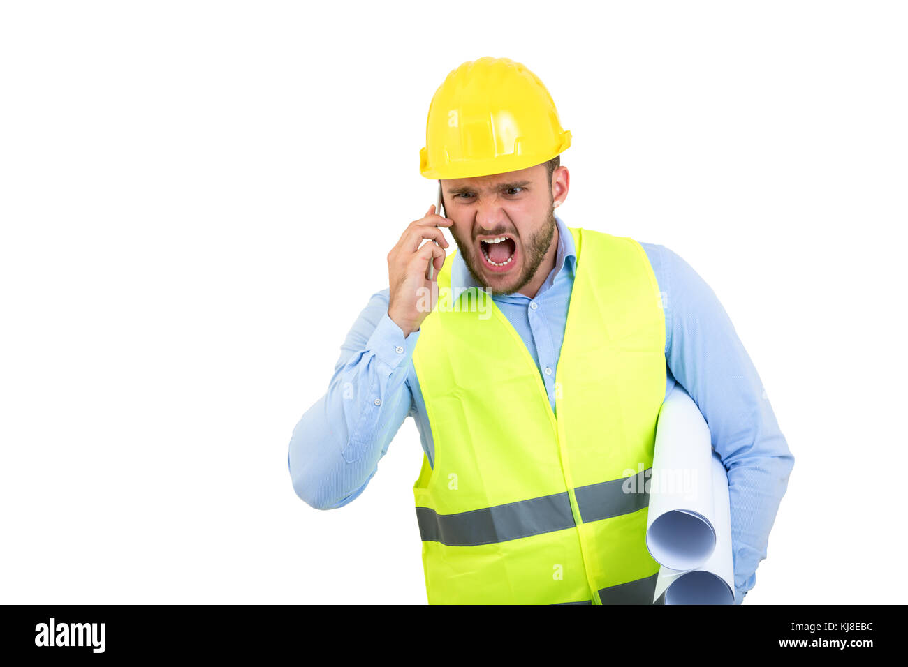 Angry upset young construction engineer yeling at the phone Stock Photo ...