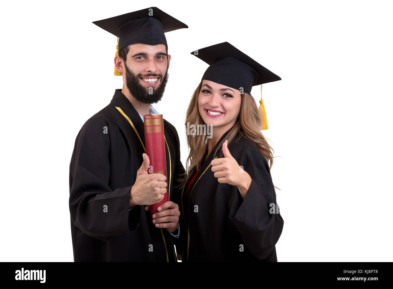 Portrait of two happy graduating students. Isolated over white ...