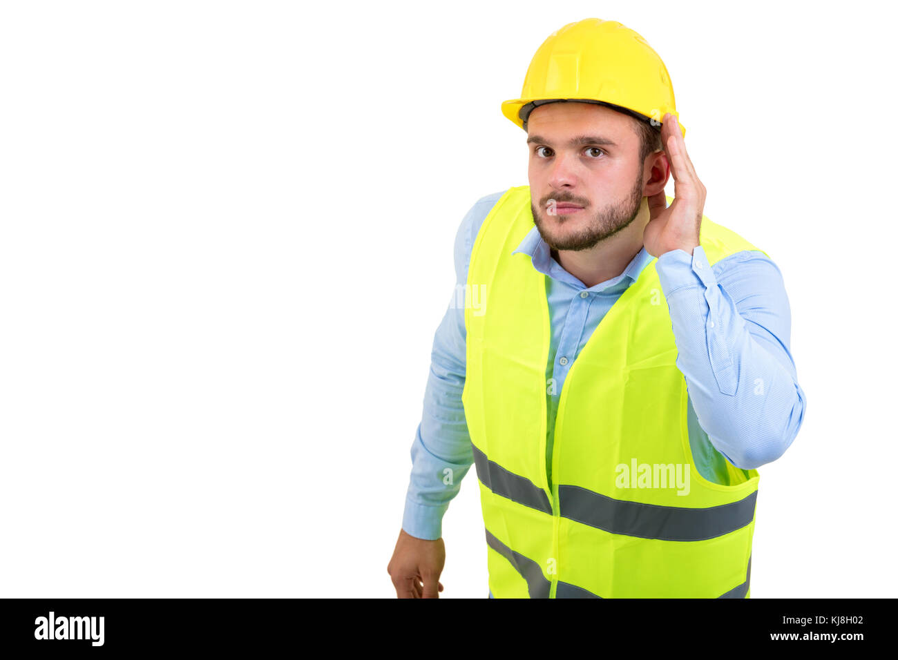 Happy professional engineer pointing to something isolated on white ...