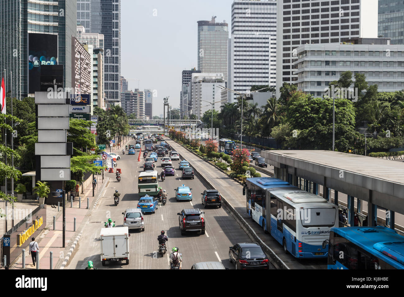 JAKARTA, INDONESIA - OCTOBER 13, 2017: Traffic goes along Sudirman ...
