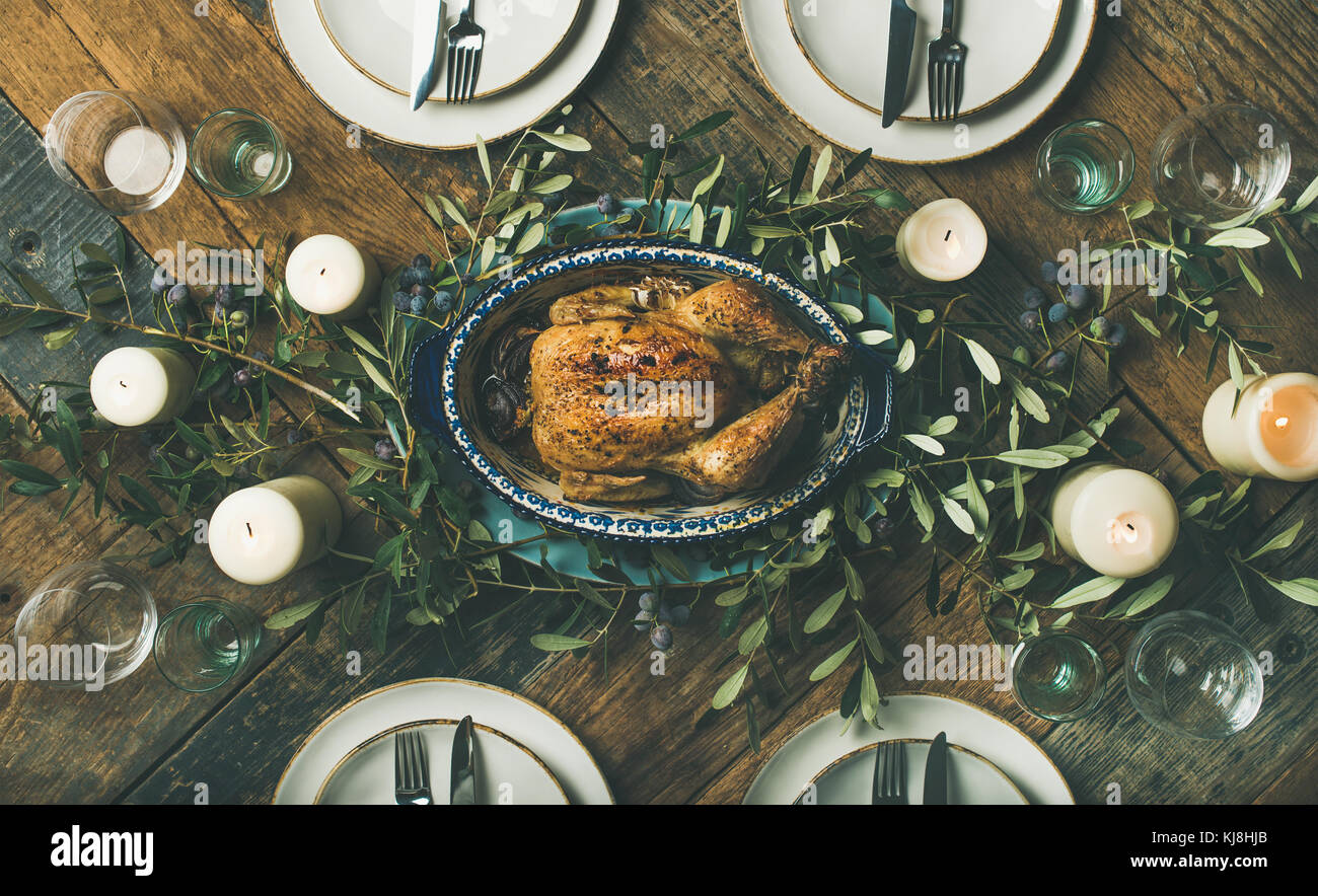 Holiday table setting for party, gathering or celebration roast chicken ...