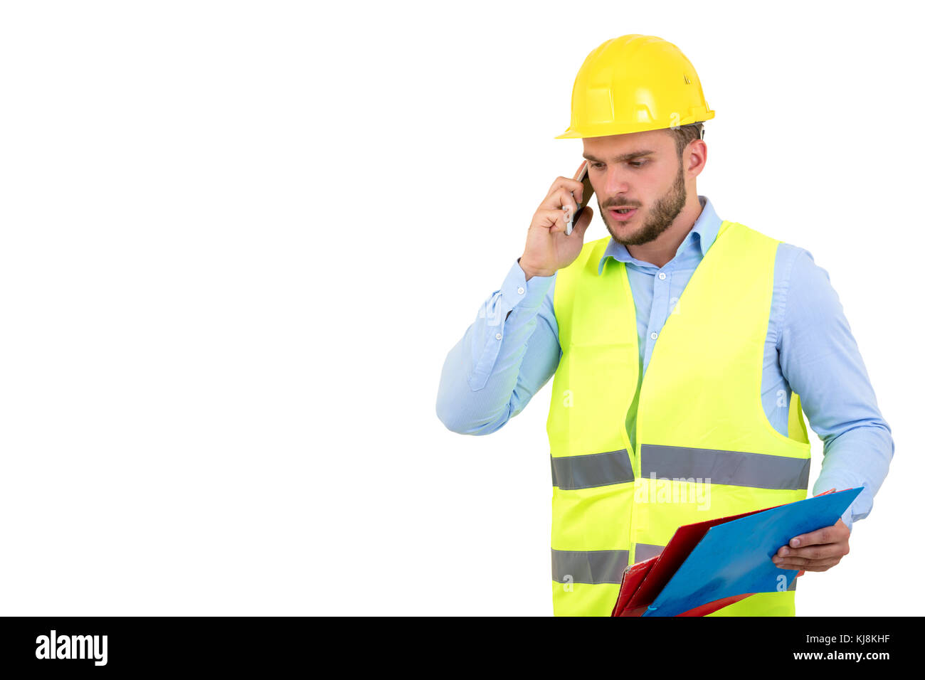 Angry upset young construction engineer yeling at the phone Stock Photo ...