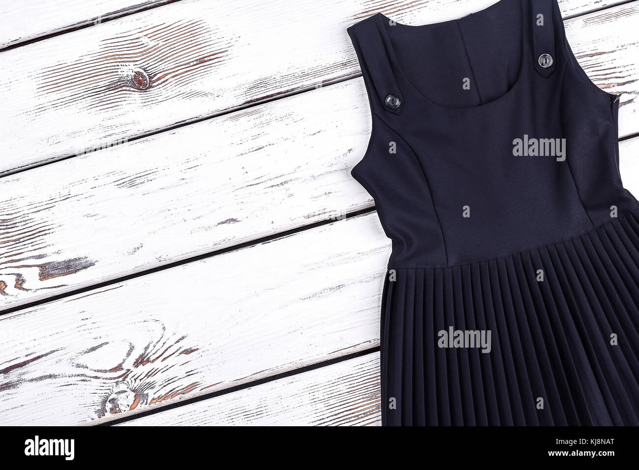 Girls black school dress, copy space. Girls school uniform sleeveless ...