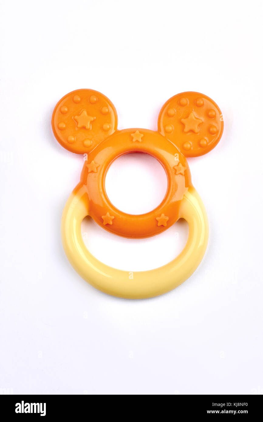 Orange color baby teether isolated. Cute teether for babies isolated on ...