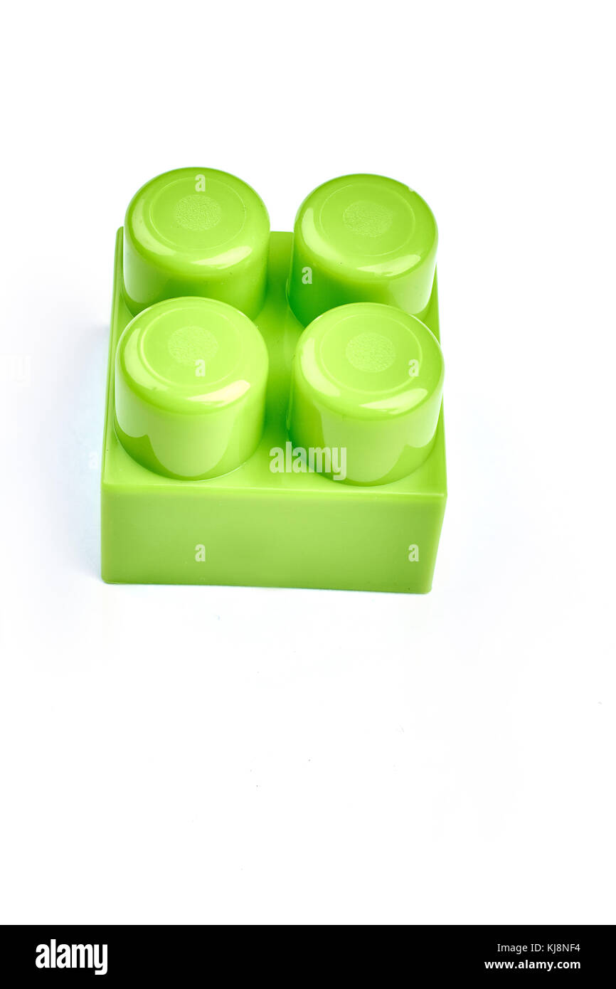 Kids green plastic construction element. Plastic construction element ...