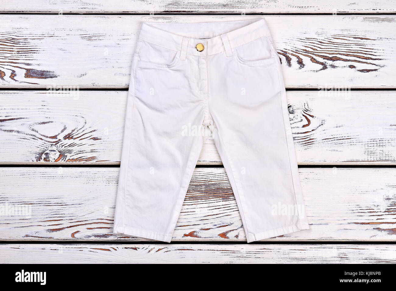 Little girls solid capri isolated. Childrens white cotton trousers ...