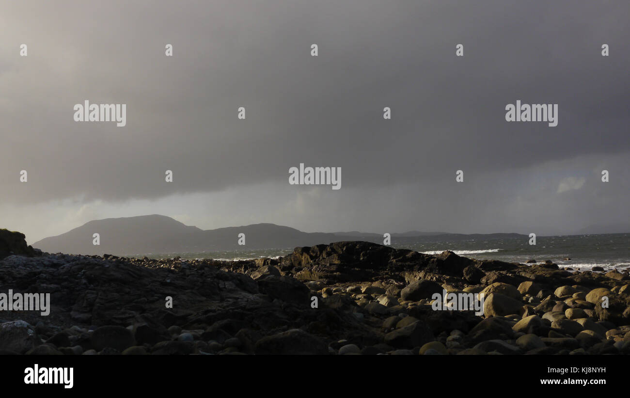 The rugged landscape of the West of Ireland.The sun is trying it's ...