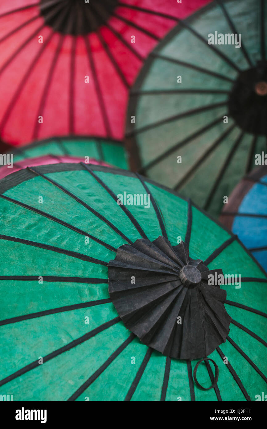 Colorful handmade paper umbrellas at traditional street night market in ...
