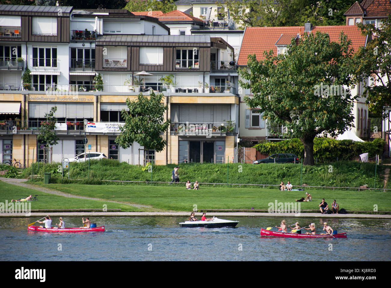 German and foreigner travelers people playing and paddle boat canoe and ...