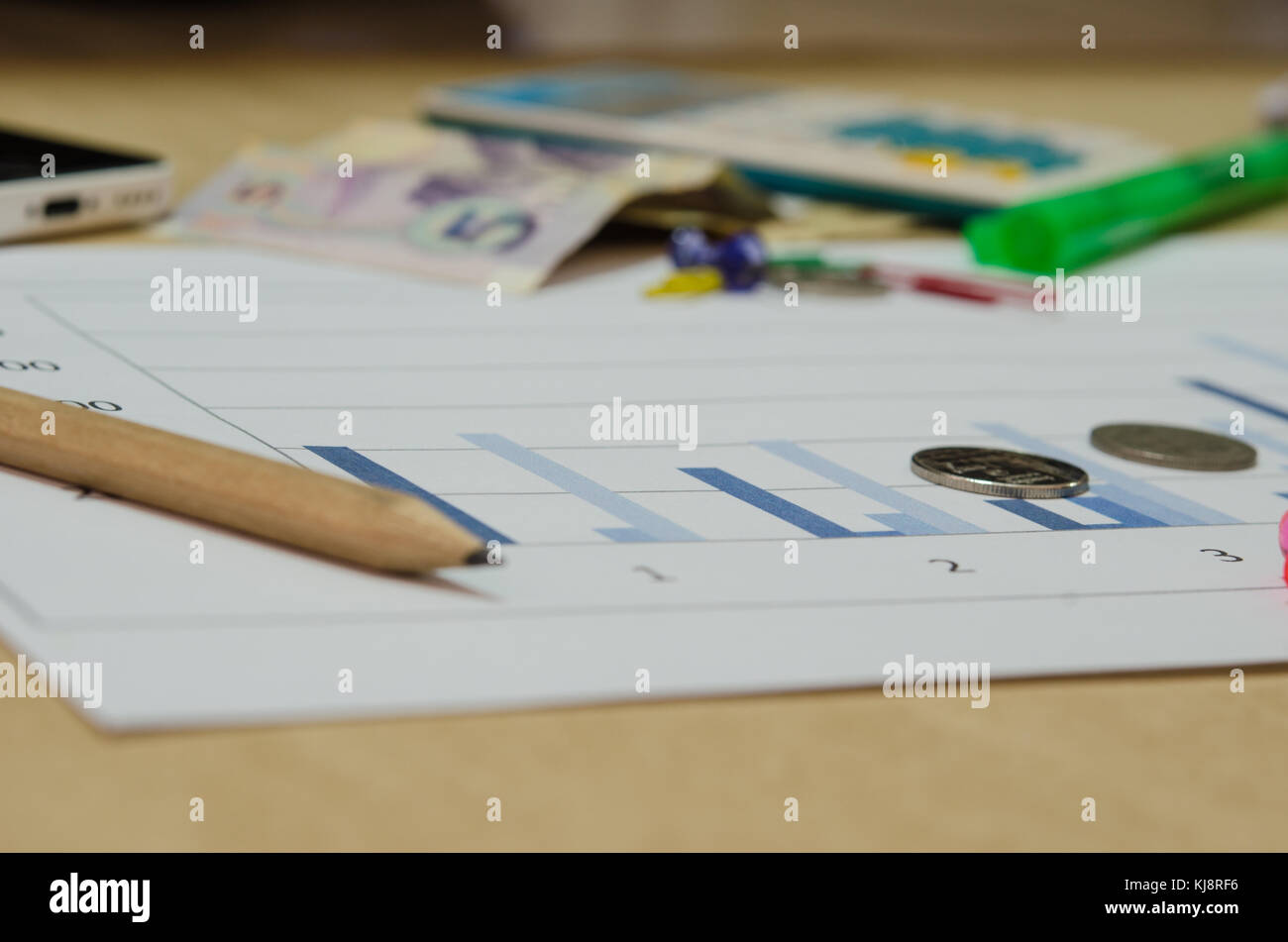 business report and chart on table Stock Photo - Alamy