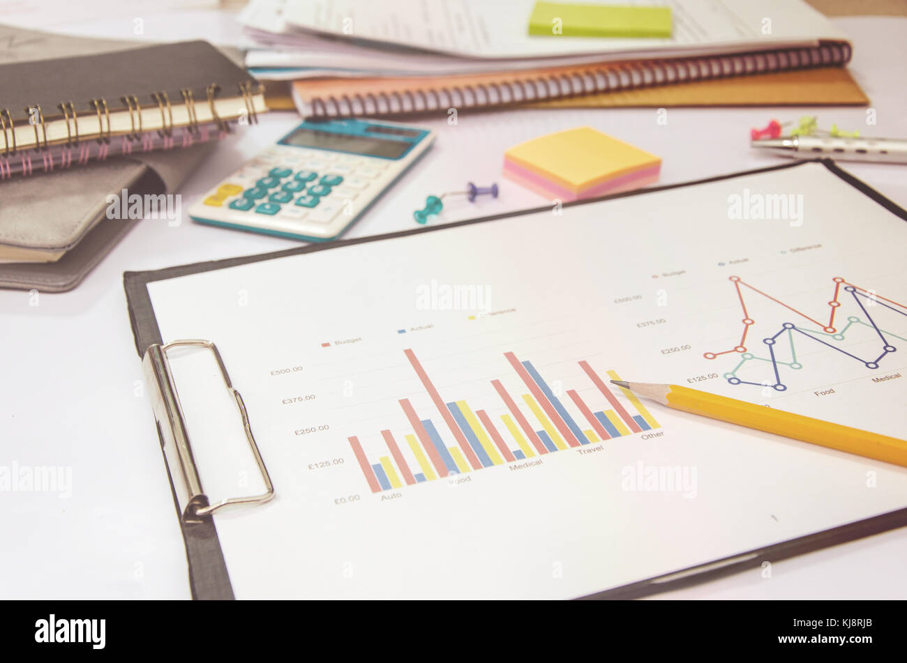 business documents graph financial on table with pencil and diagram ...