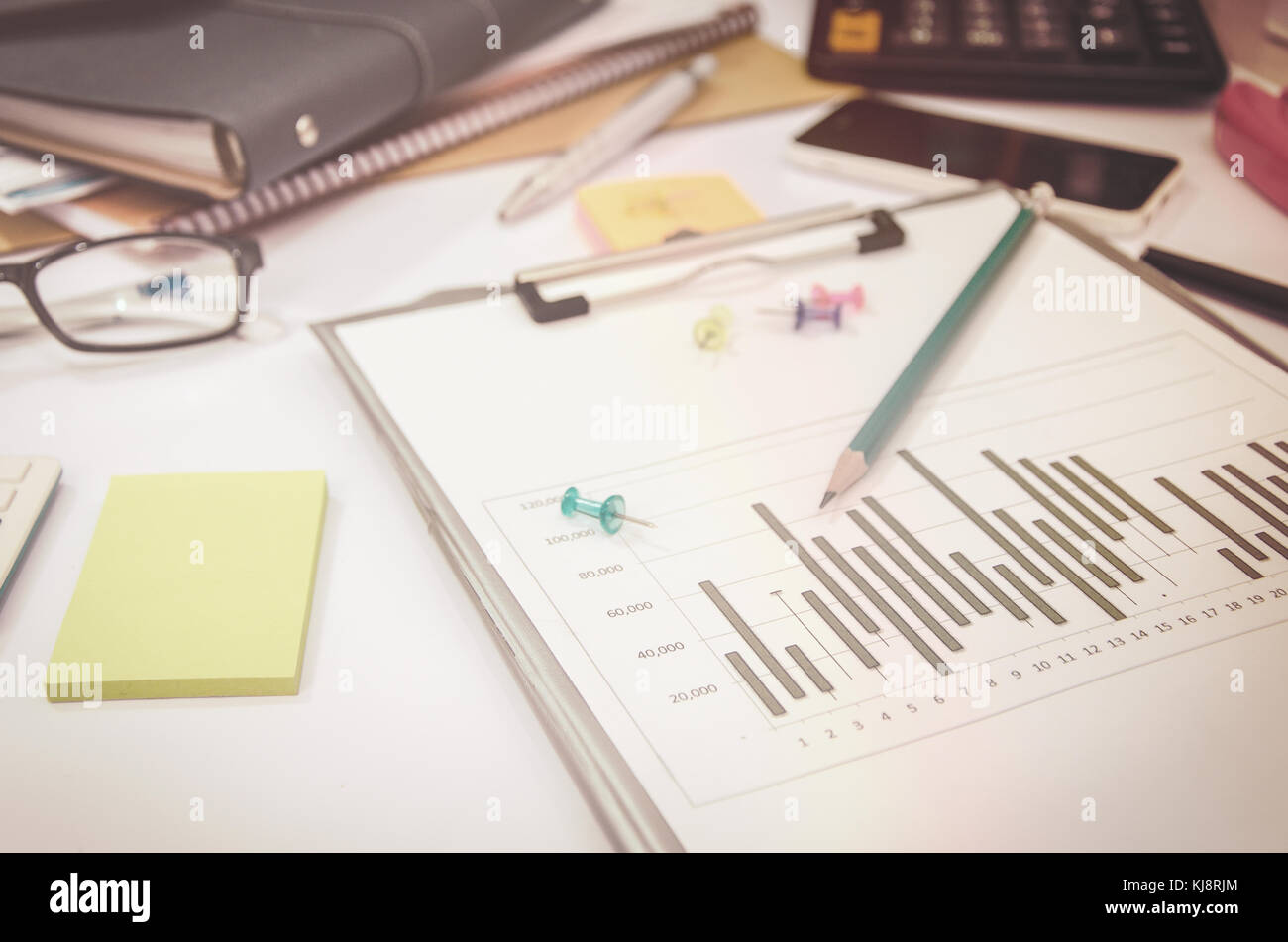 business report and chart on table Stock Photo - Alamy