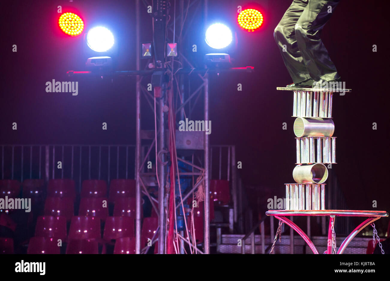 Circus equilibrist artist balancing on rings. Circus arena Stock Photo ...