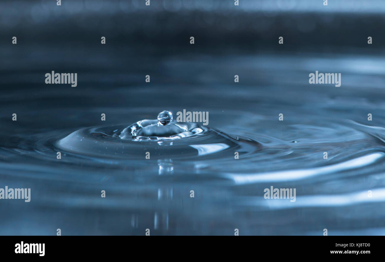 Water drop. Water splash in dark Stock Photo - Alamy
