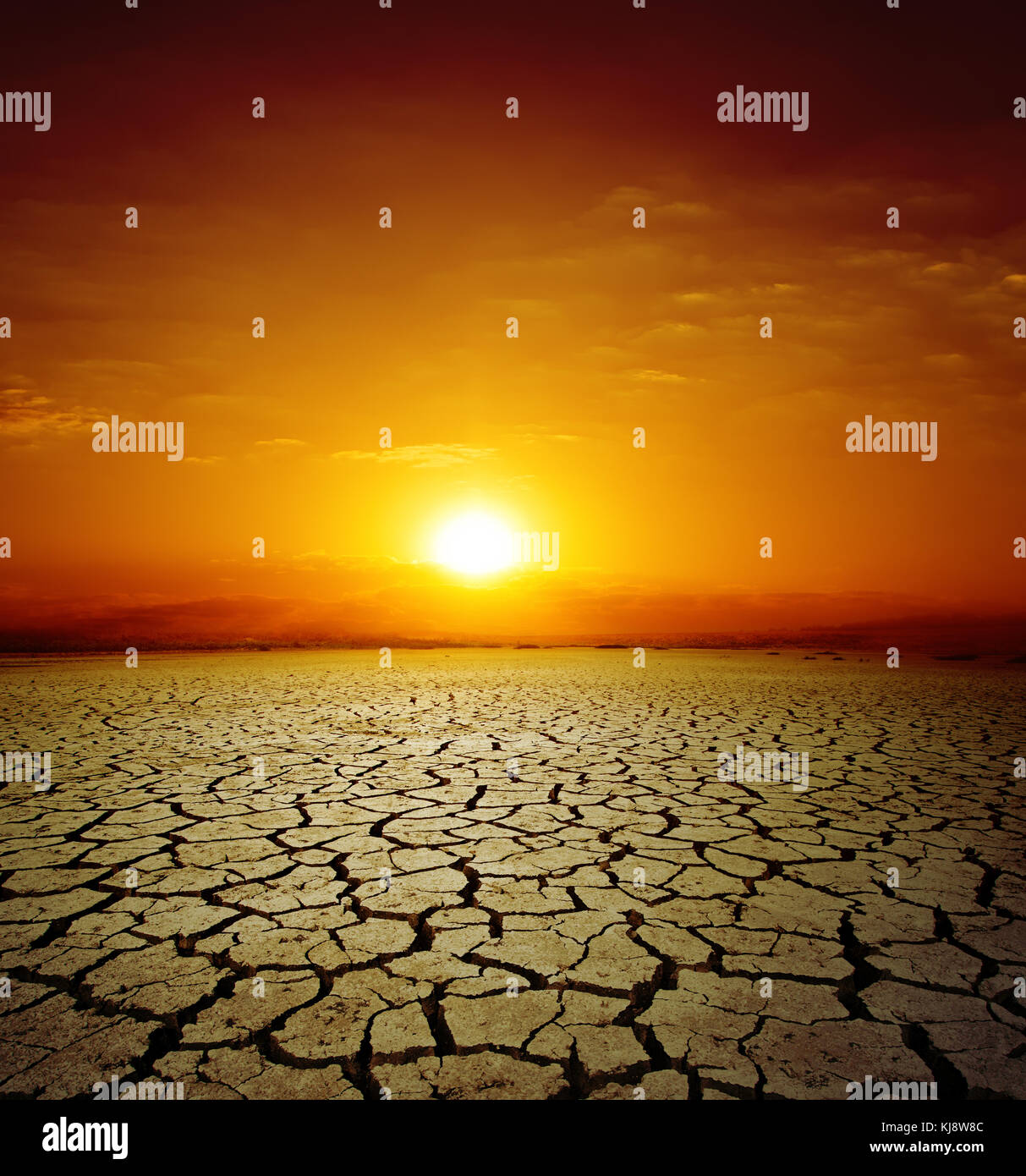 red sunset over drought earth. change of climate Stock Photo - Alamy
