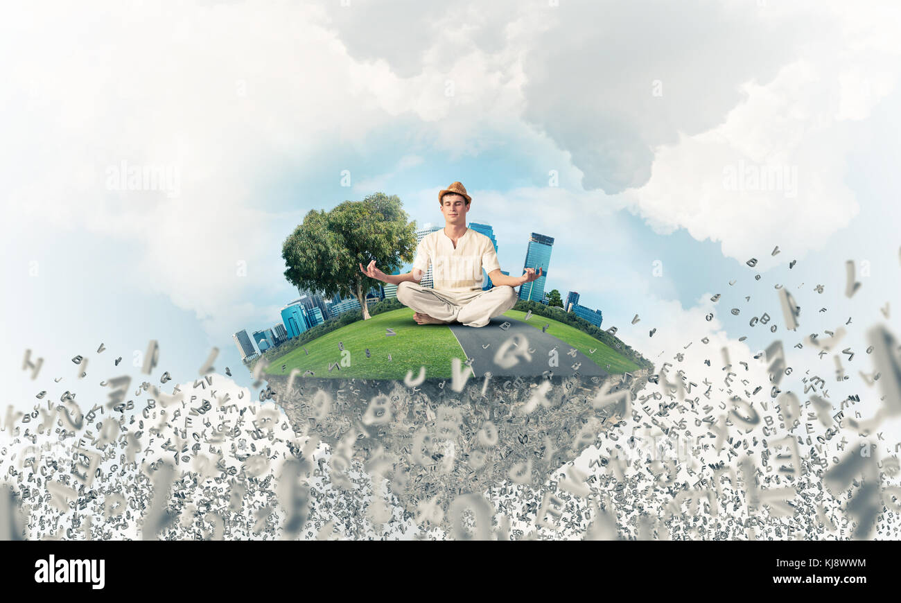 Young man keeping mind conscious Stock Photo - Alamy