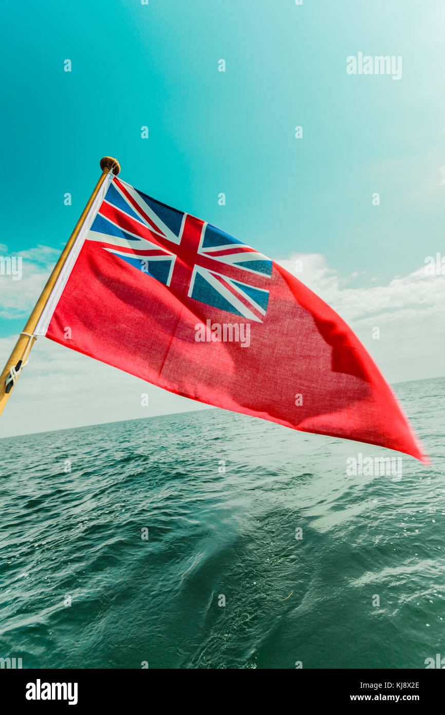 The uk red ensign the british maritime flag flown from yacht sail boat ...