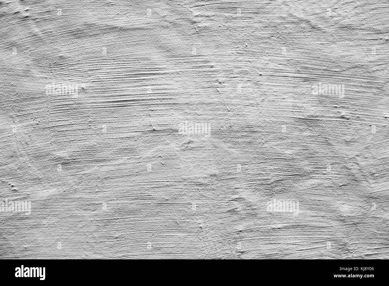 Gray concrete wall with stucco relief pattern, background photo texture ...