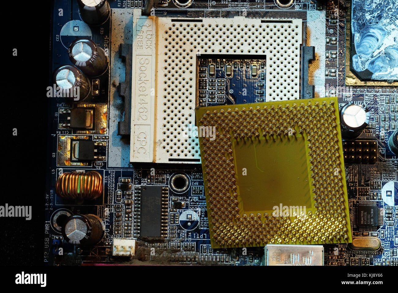 Computer mother board showing CPU, central processing unit chip removed ...