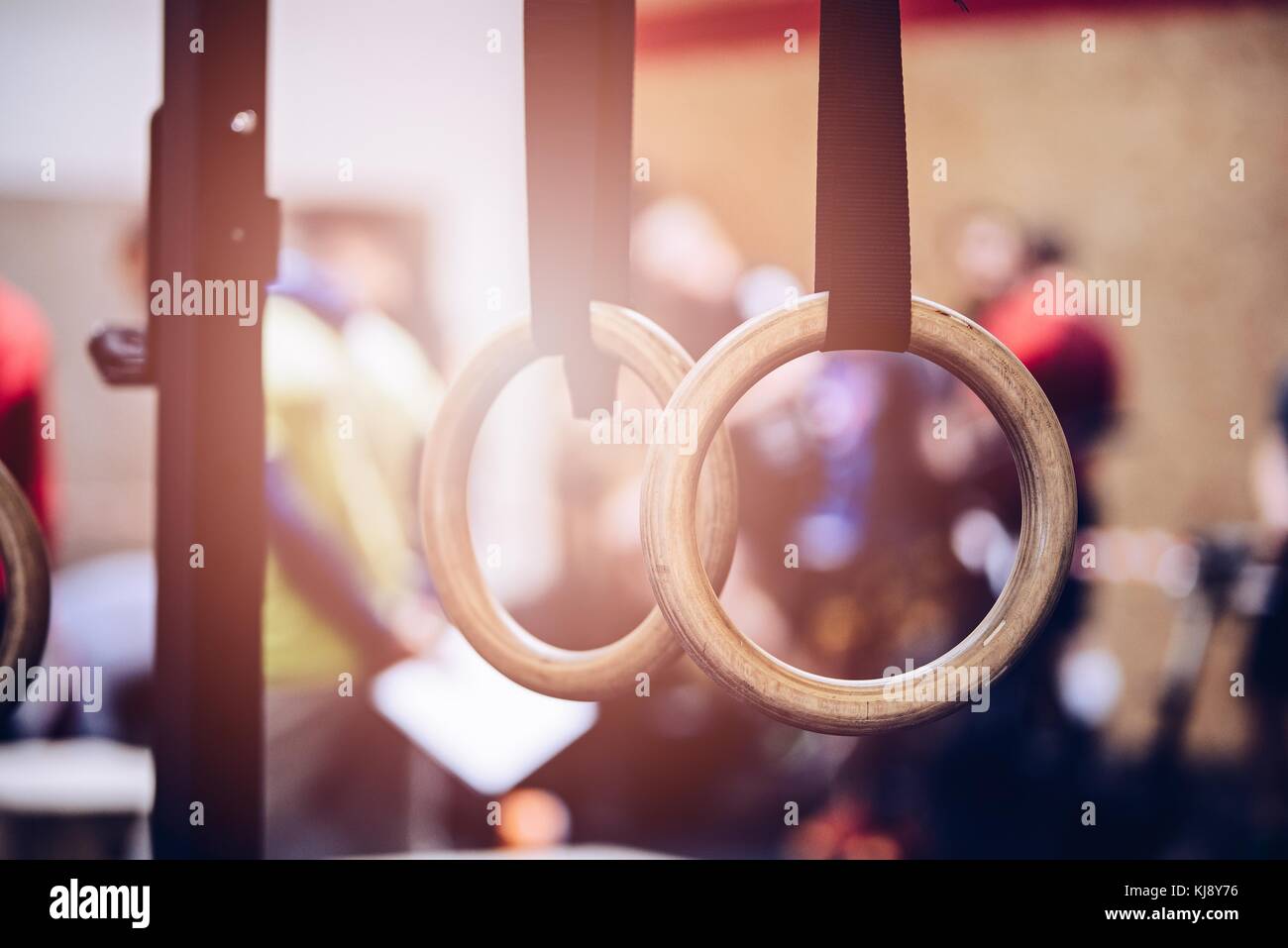 Wooden gymnastic rings in functional fitness gym Stock Photo - Alamy
