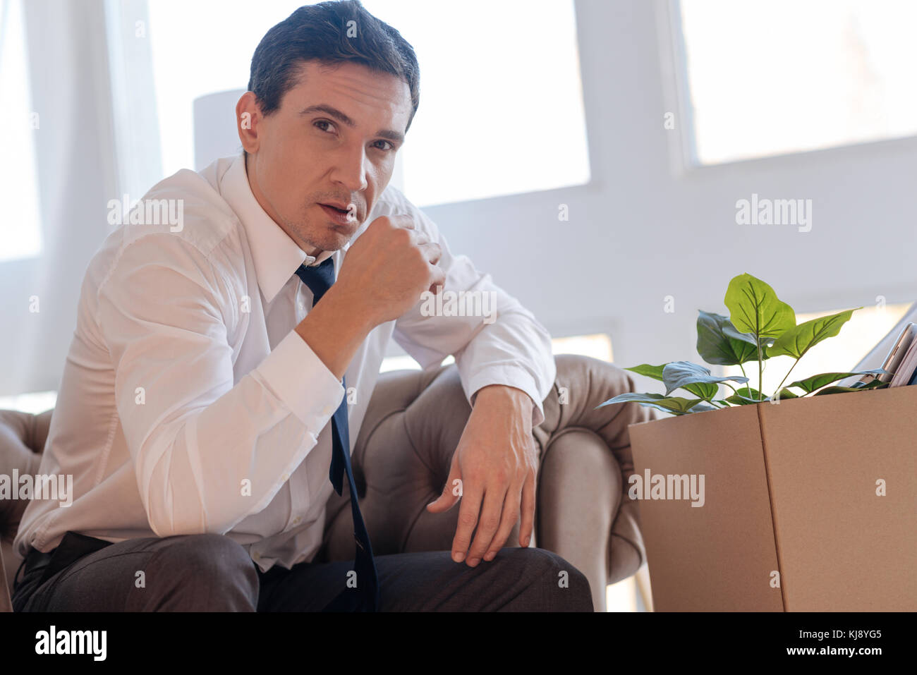Impressed young man not believing in losing his job Stock Photo - Alamy