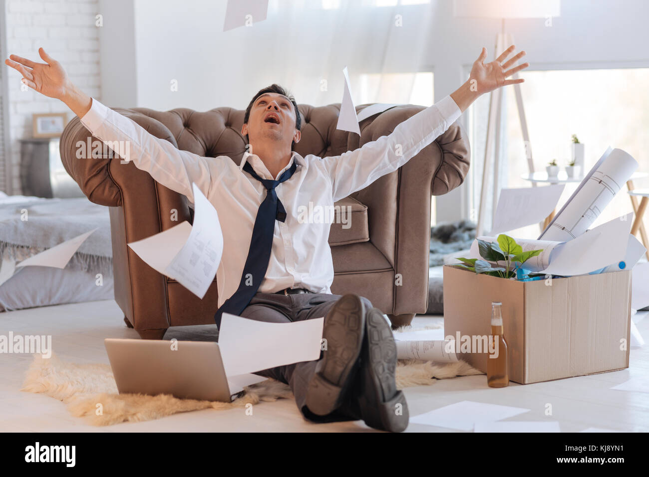 Emotional young man feeling good while being at home Stock Photo - Alamy