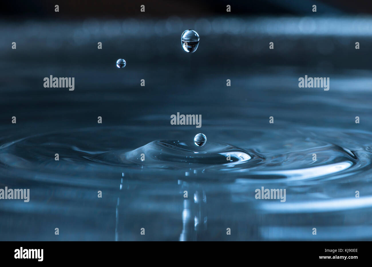 Water drop. Water splash in dark Stock Photo - Alamy