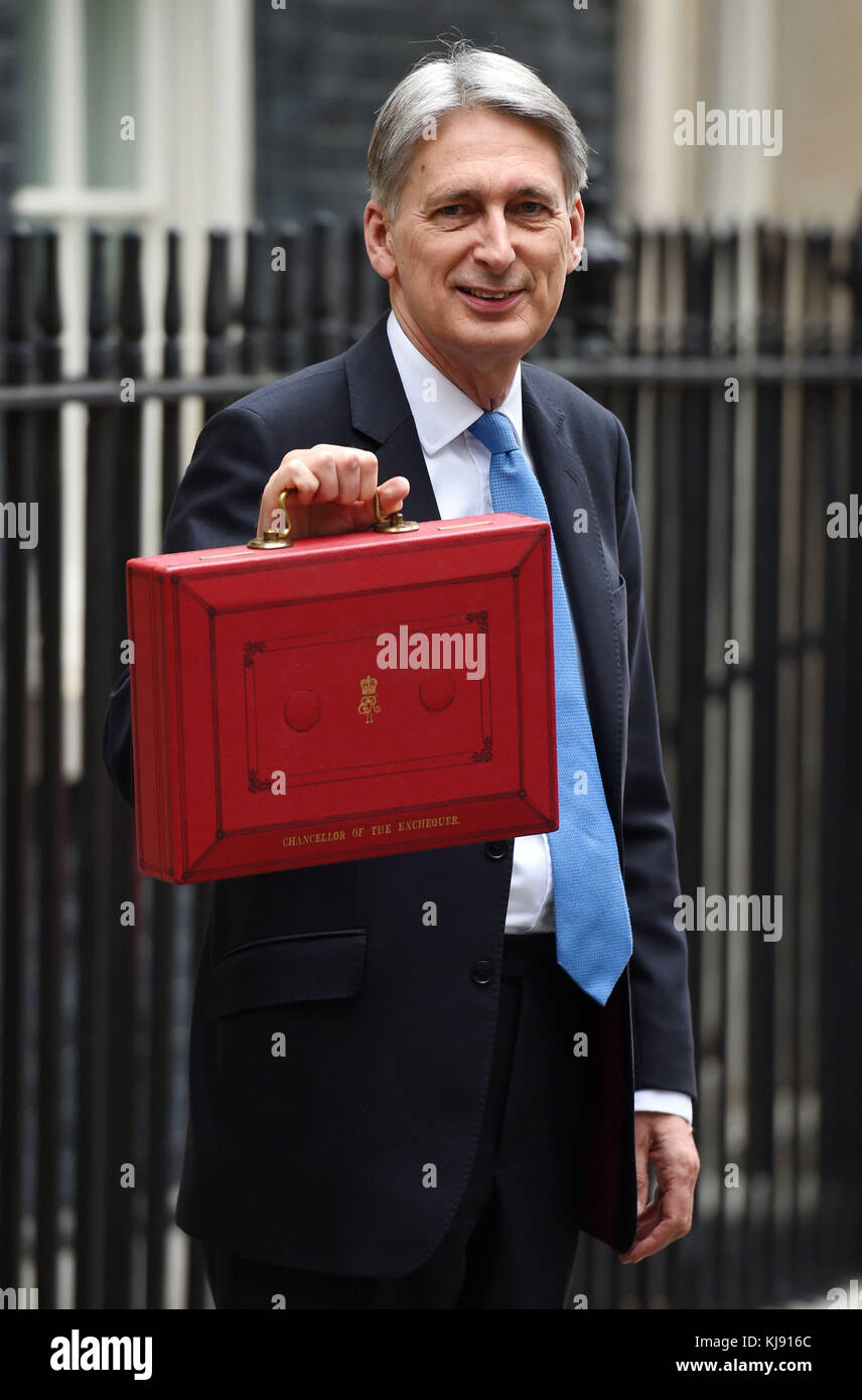 Chancellor philip hammond holding his red ministerial box hi-res stock ...