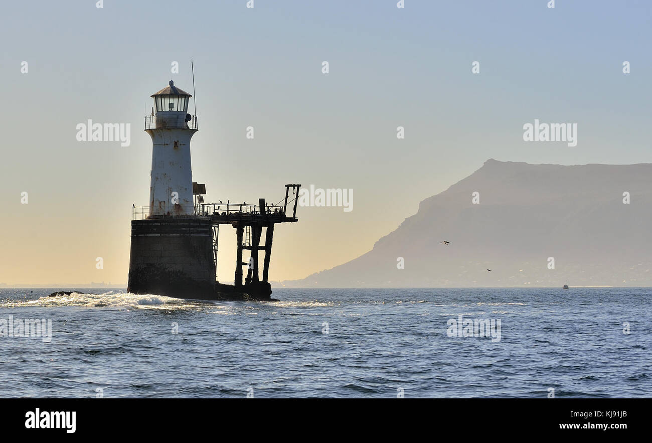 Roman Rock Lighthouse in False Bay. Standing at the entrance to ...