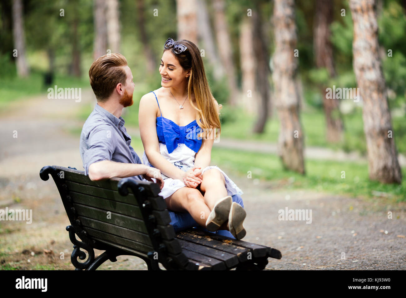 Romantic couple in park Stock Photo - Alamy