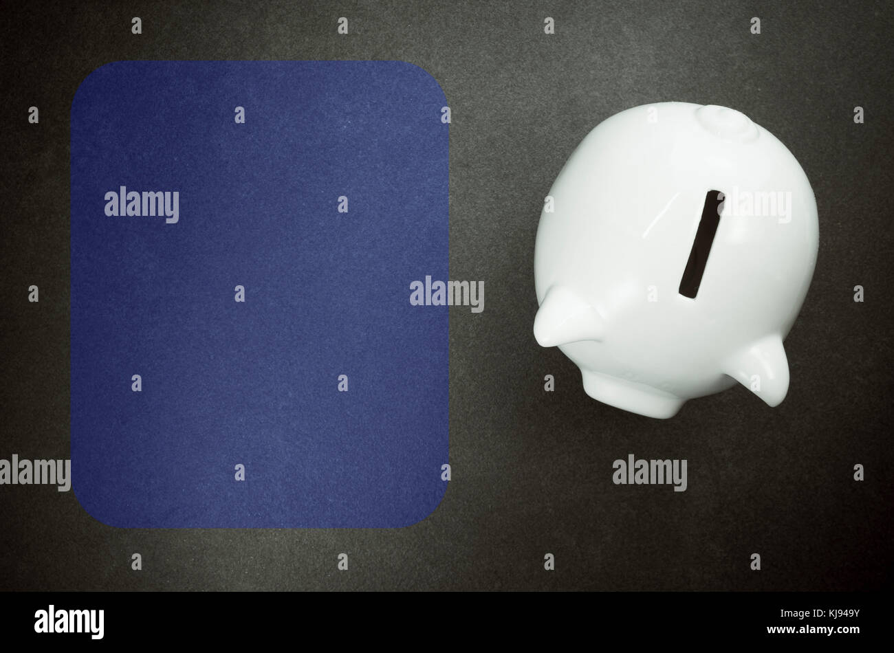 terracotta piggy bank on a stone background - top view - money saving ...